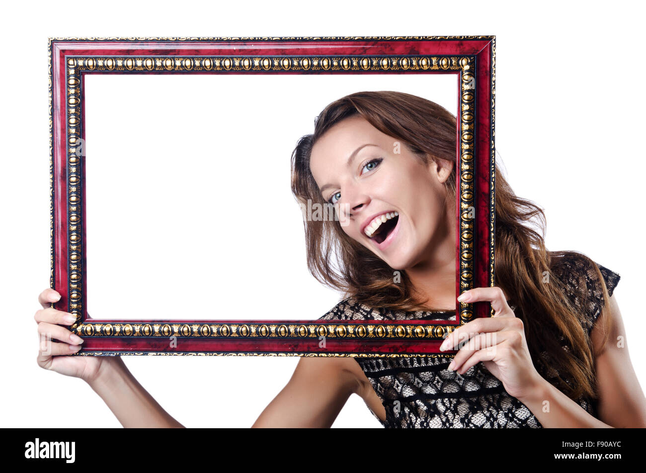 Young woman with picture frame on white Stock Photo - Alamy