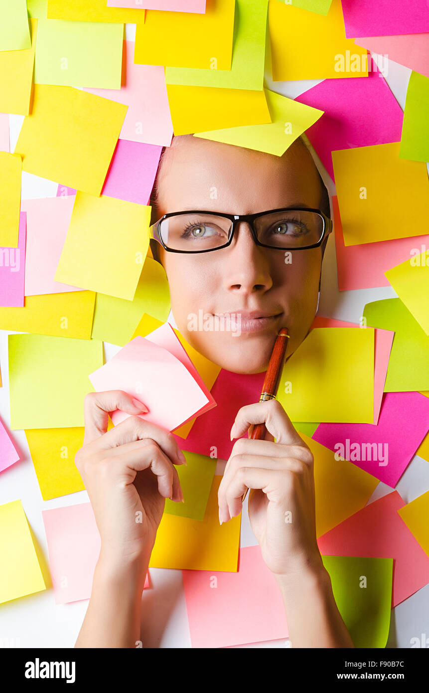 Woman with lots of reminder notes Stock Photo - Alamy