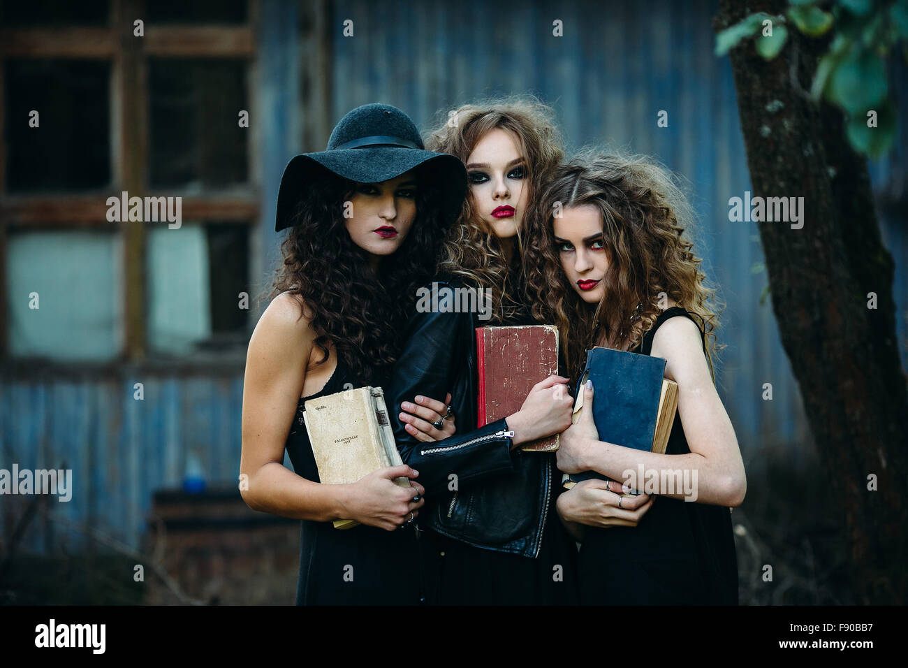 three vintage women as witches Stock Photo - Alamy