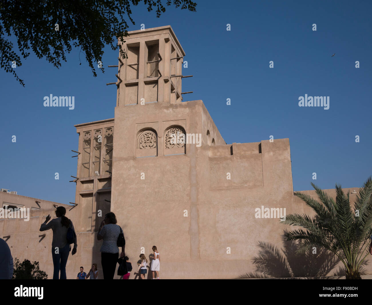 Tourists in Dubai heritage area; Bastakia, Bur Dubai Stock Photo - Alamy