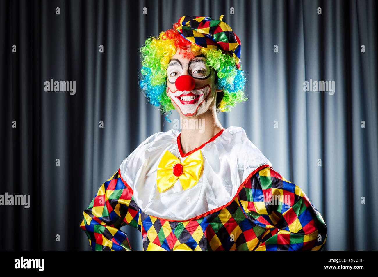 Funny clown in the studio shooting Stock Photo - Alamy