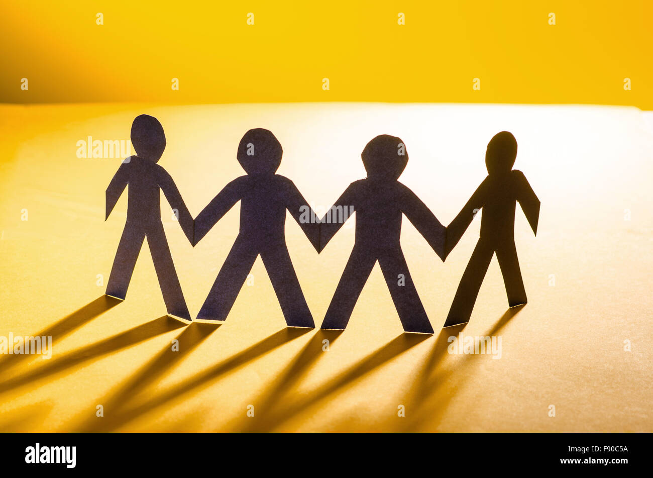 Paper people in teamworking concept Stock Photo - Alamy