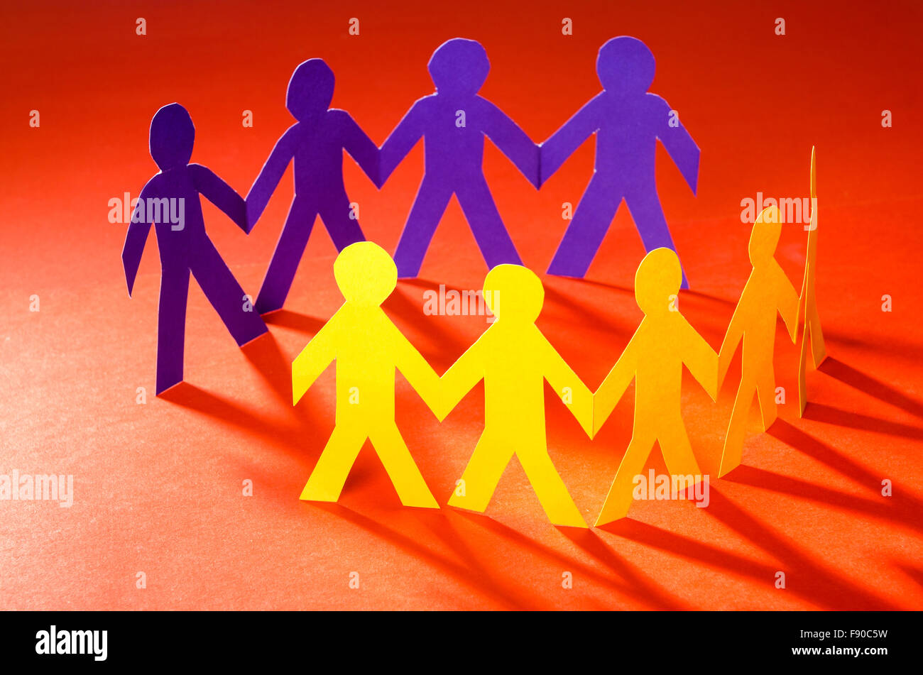 Paper people in teamworking concept Stock Photo - Alamy
