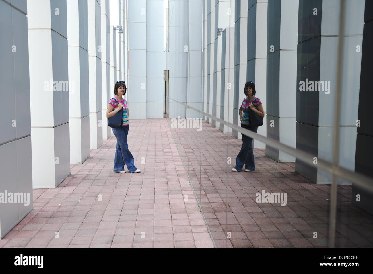 Beautiful woman outdoor modern city urban street scene with abstract ...