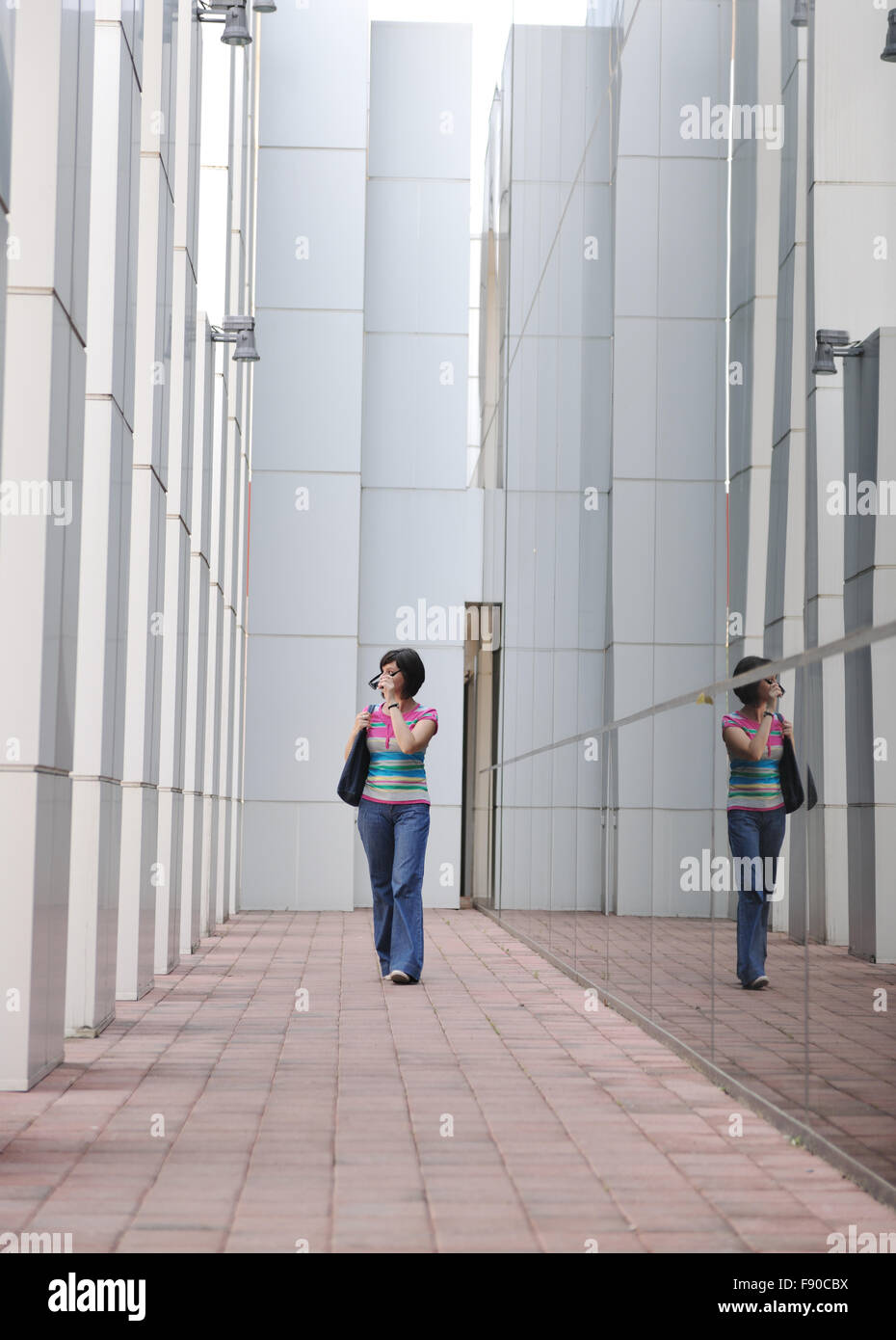 Beautiful woman outdoor modern city urban street scene with abstract ...