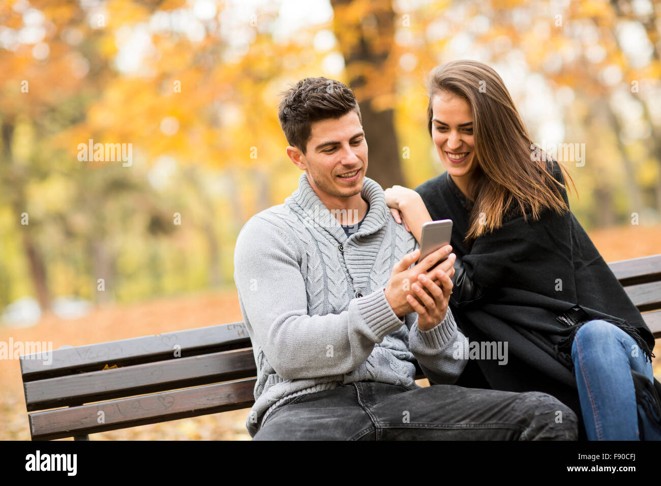 Autumn on bench hi-res stock photography and images - Alamy