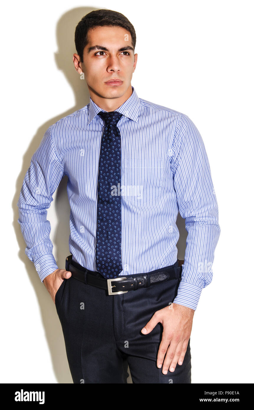 Male model with shirt isolated on white Stock Photo - Alamy