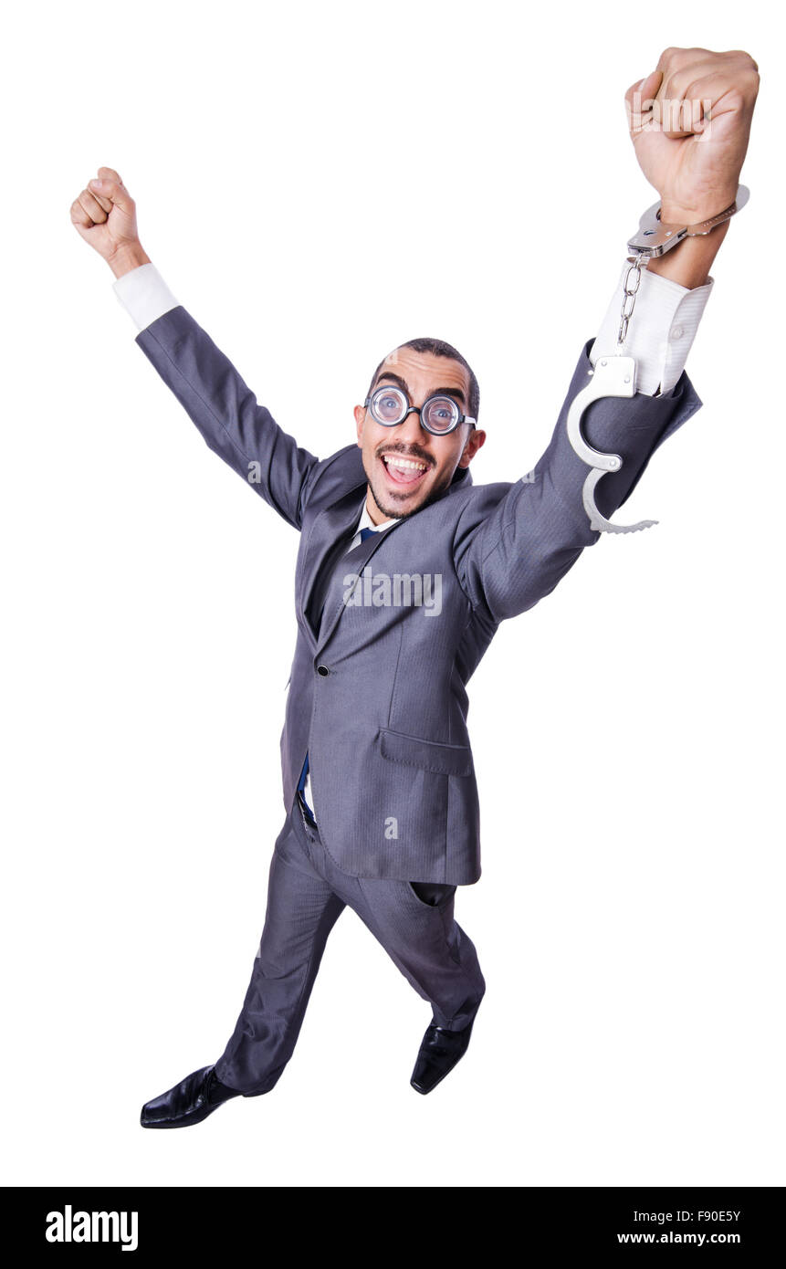 Funny businessman with handcuffs on white Stock Photo - Alamy