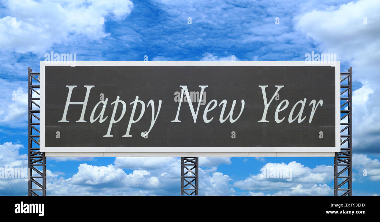 Happy new year on large sign board with blue sky background Stock Photo ...