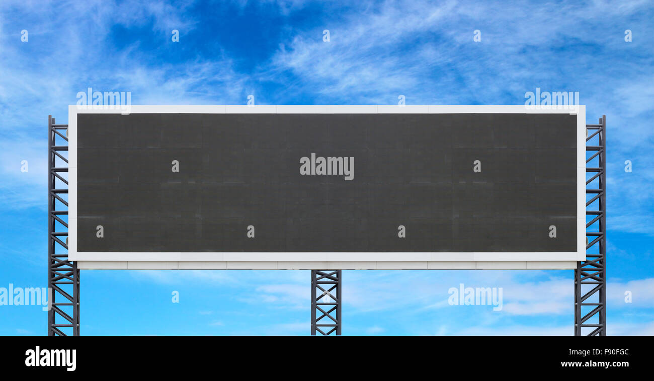 large sign board with blue sky background Stock Photo - Alamy