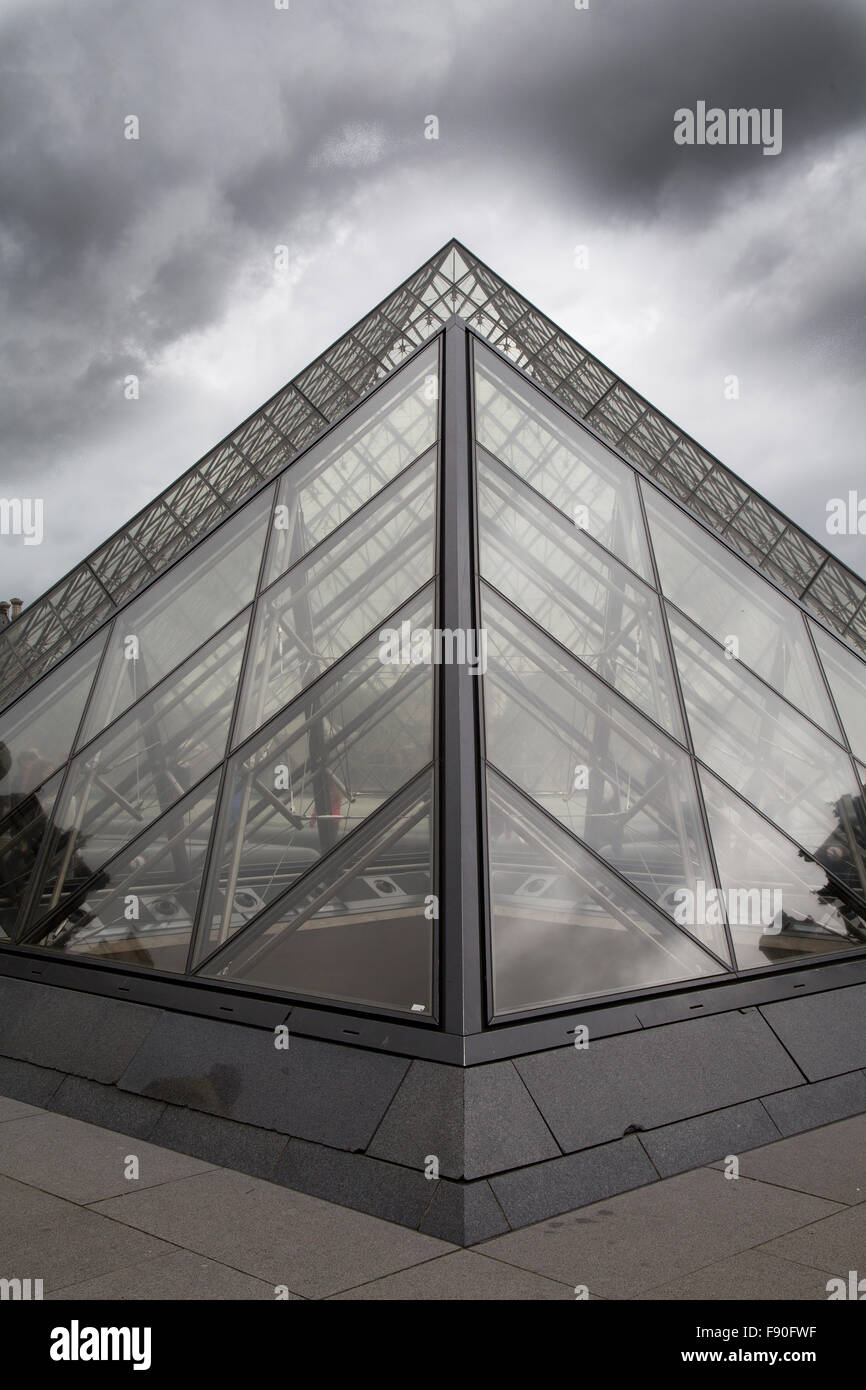 Famous Louvre Museum Pyramid made of glass in Paris, France Stock Photo ...
