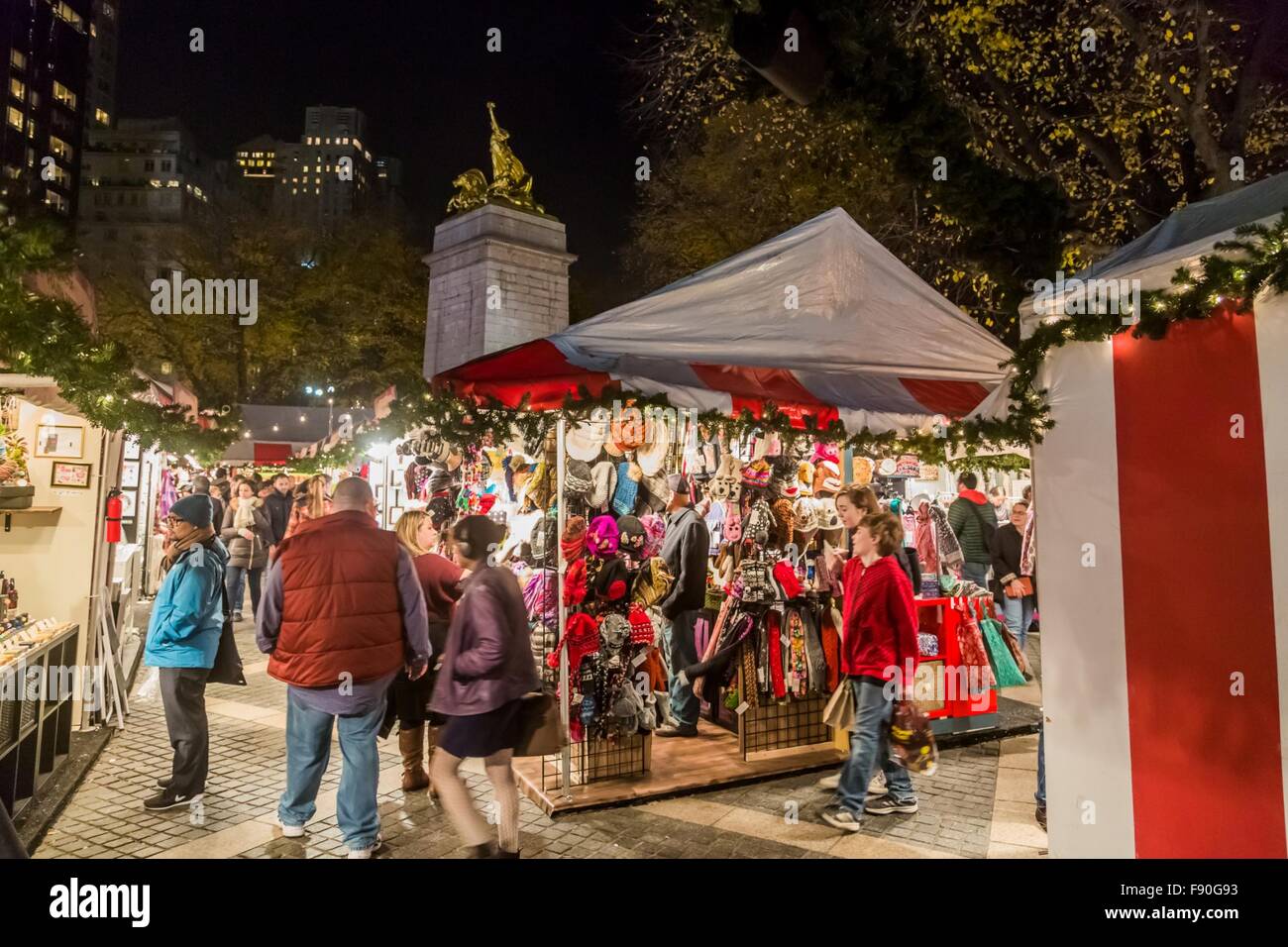 People shop at the Columbus Circle Holiday Market in New York, the ...
