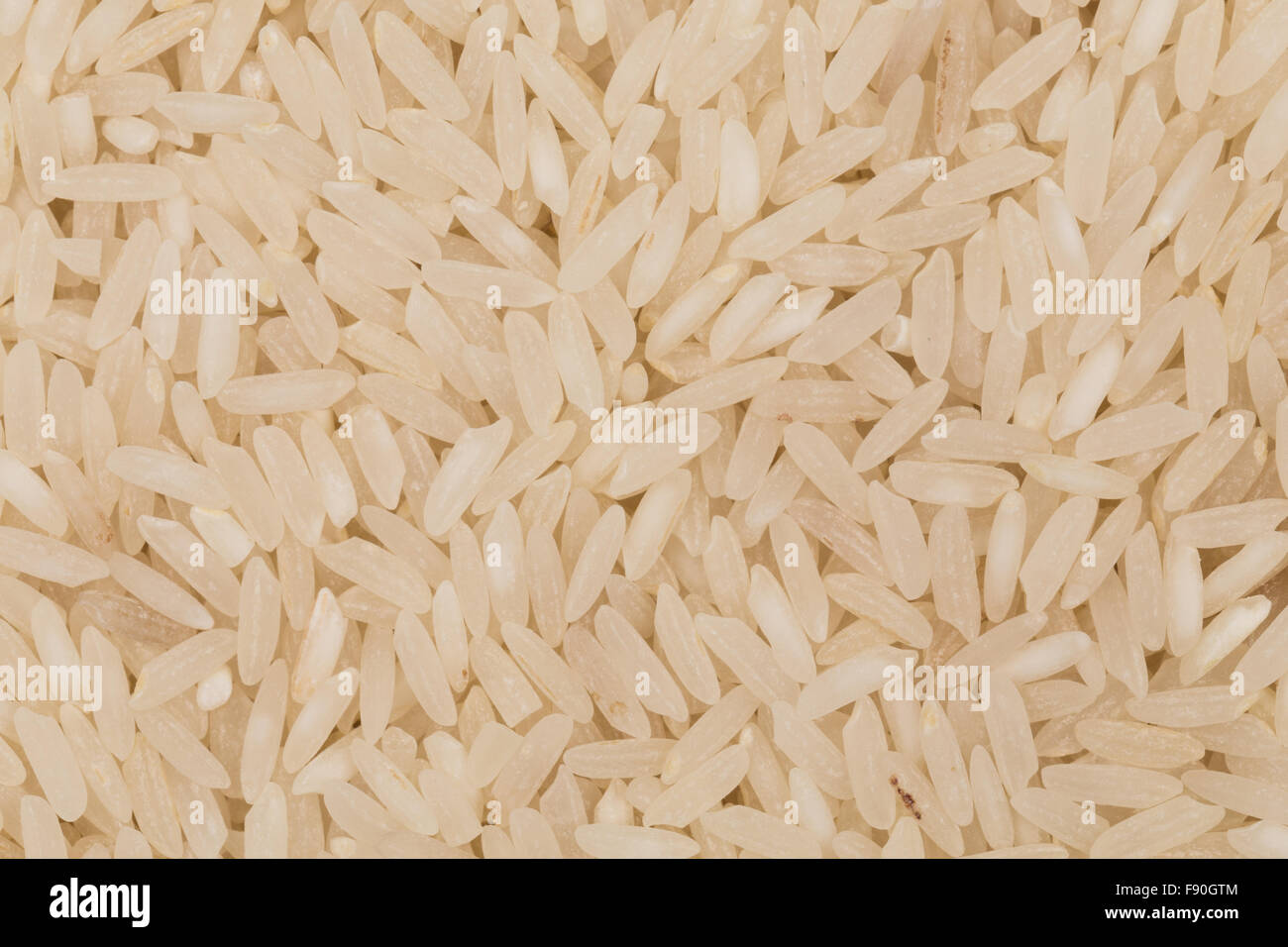 Asian white rice or uncooked white rice Stock Photo - Alamy