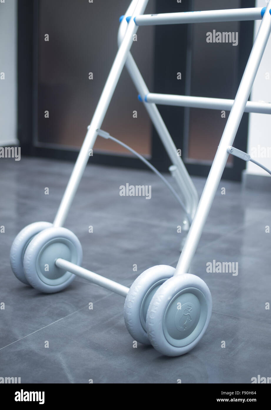 Old person walker frame with wheels in retirement home to help old age ...