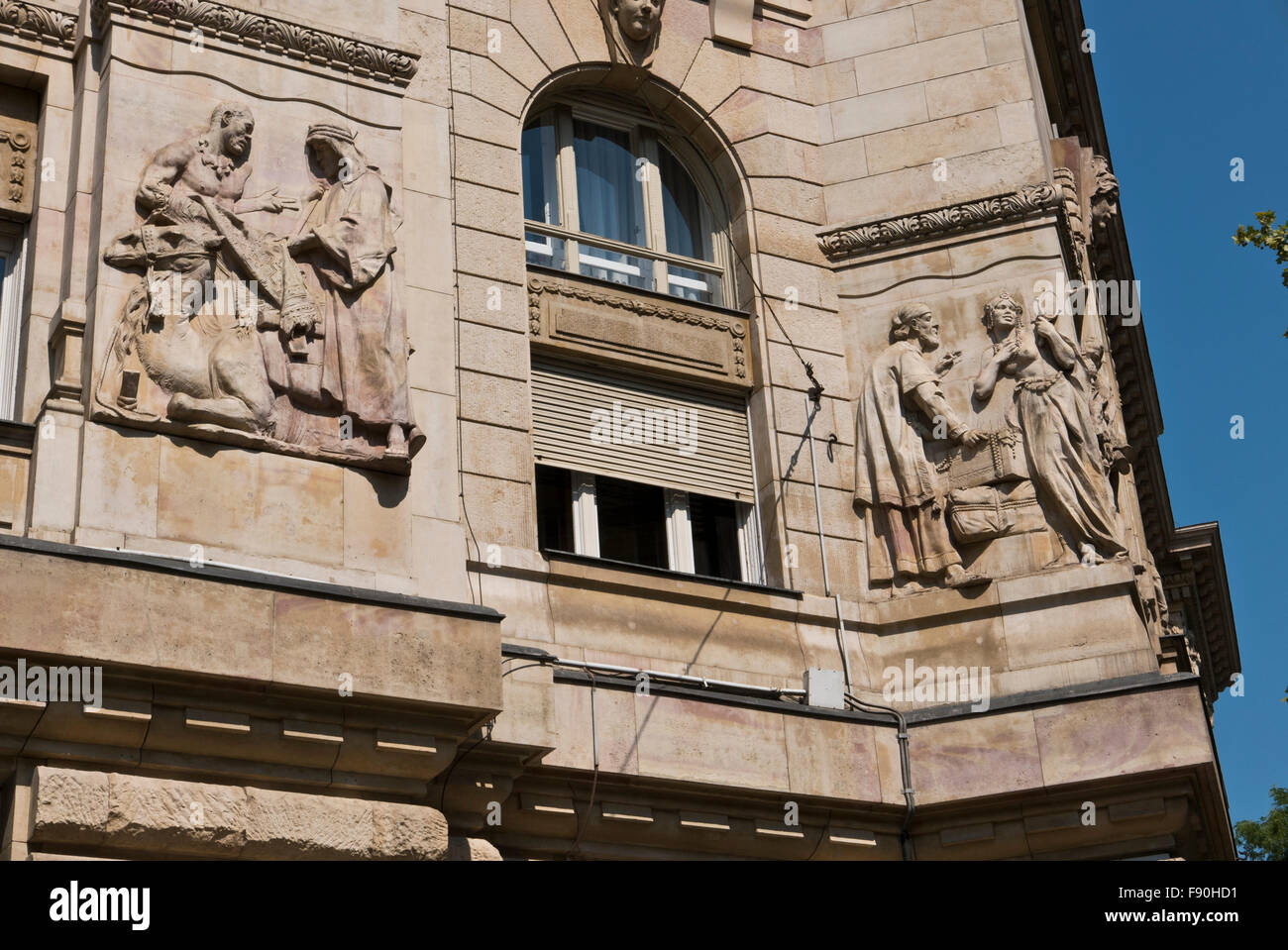 Stone carvings on the exterior wall of a building in Budapest, Hungary ...