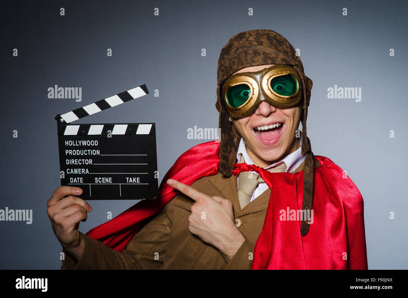 Funny pilot with goggles and helmet Stock Photo - Alamy