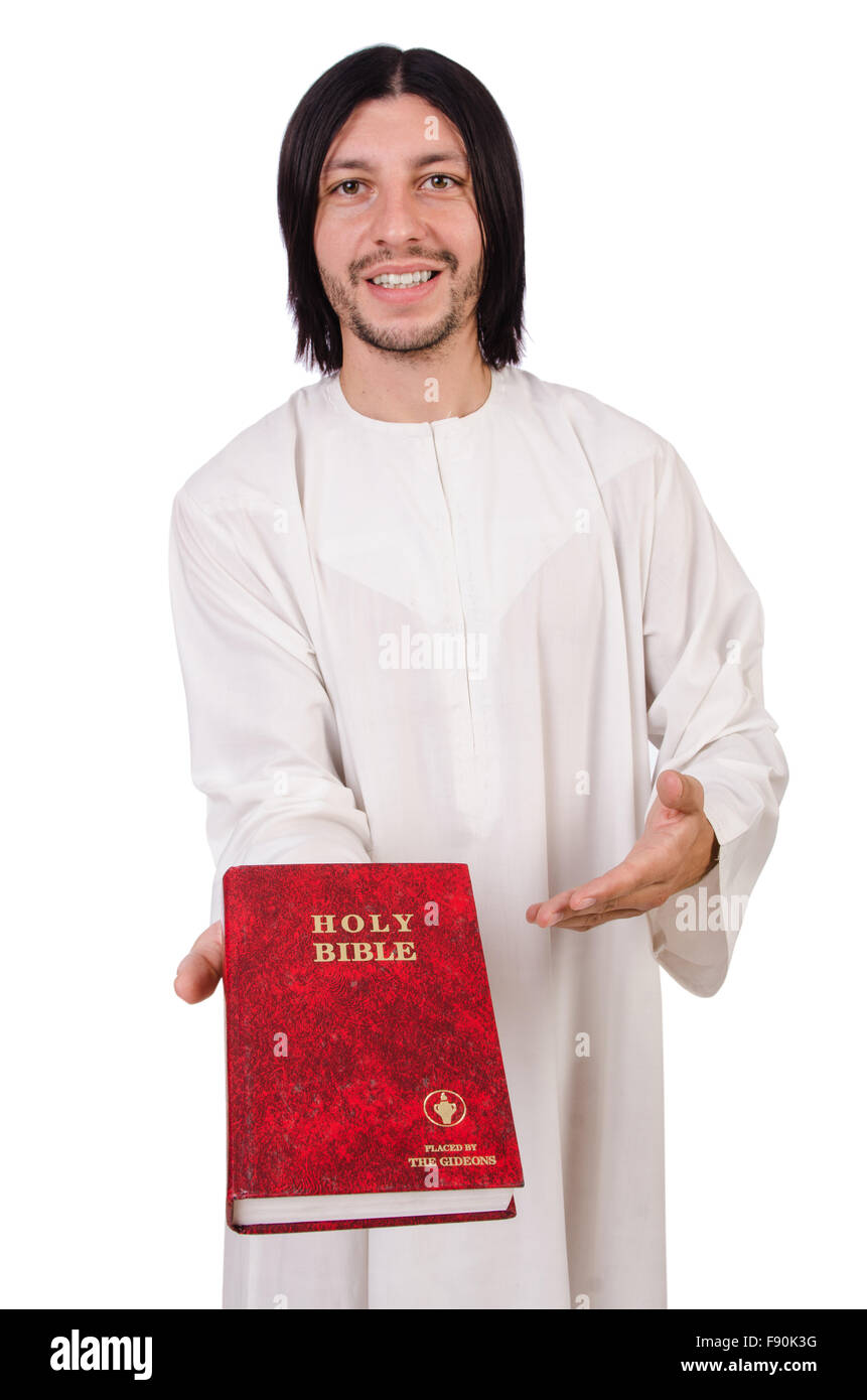 Young priest with bible isolated on white Stock Photo - Alamy