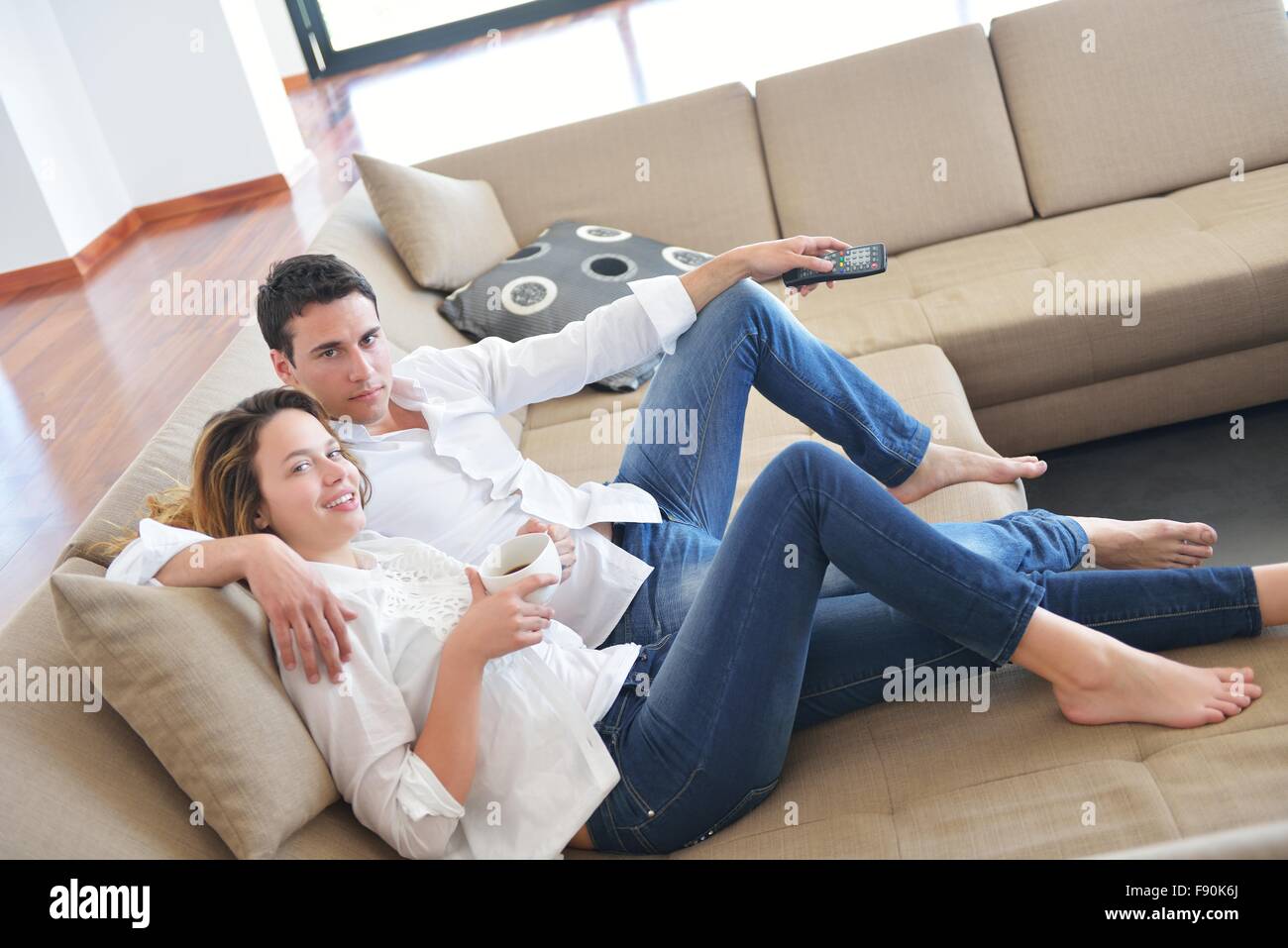 romantic happy young couple relax at home Stock Photo - Alamy
