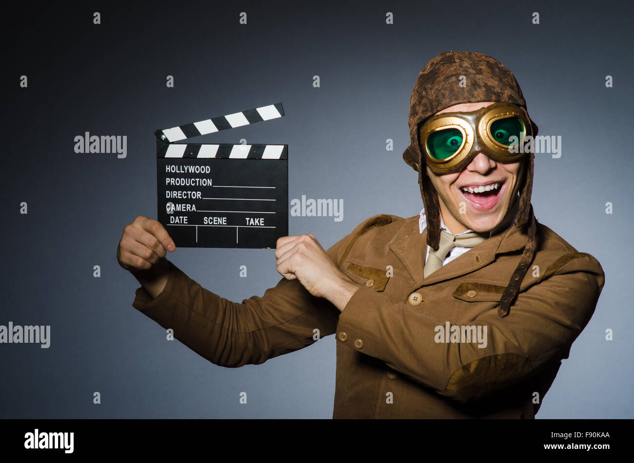 Funny pilot with goggles and helmet Stock Photo - Alamy