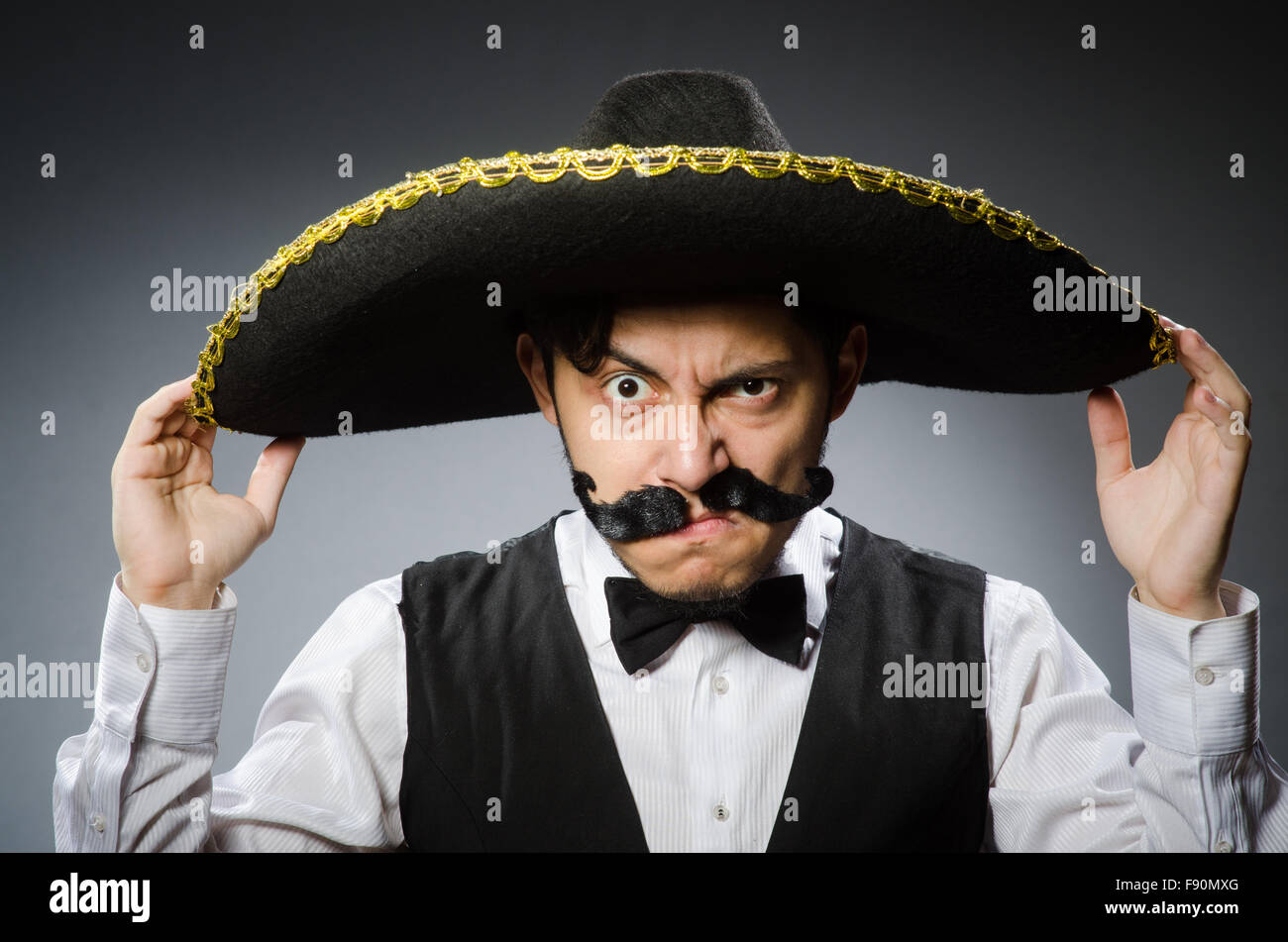 Mexican man in funny concept Stock Photo - Alamy