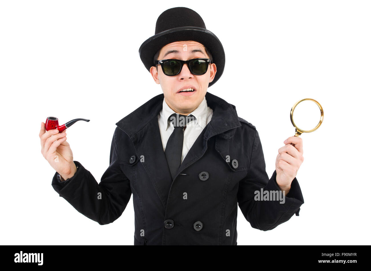 Young detective with pipe and magnifying glass Stock Photo - Alamy