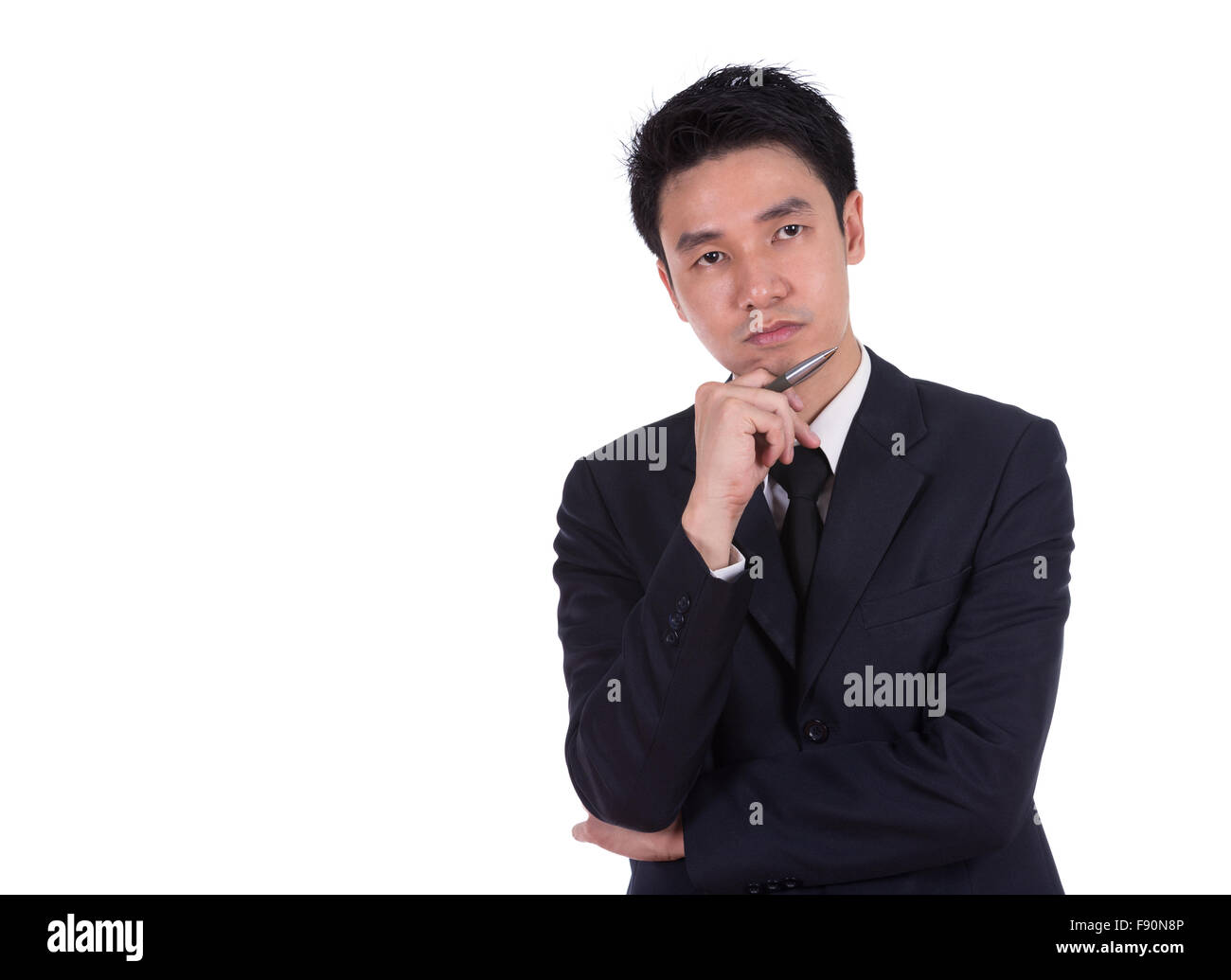 Serious business man thinking isolated on white background Stock Photo ...
