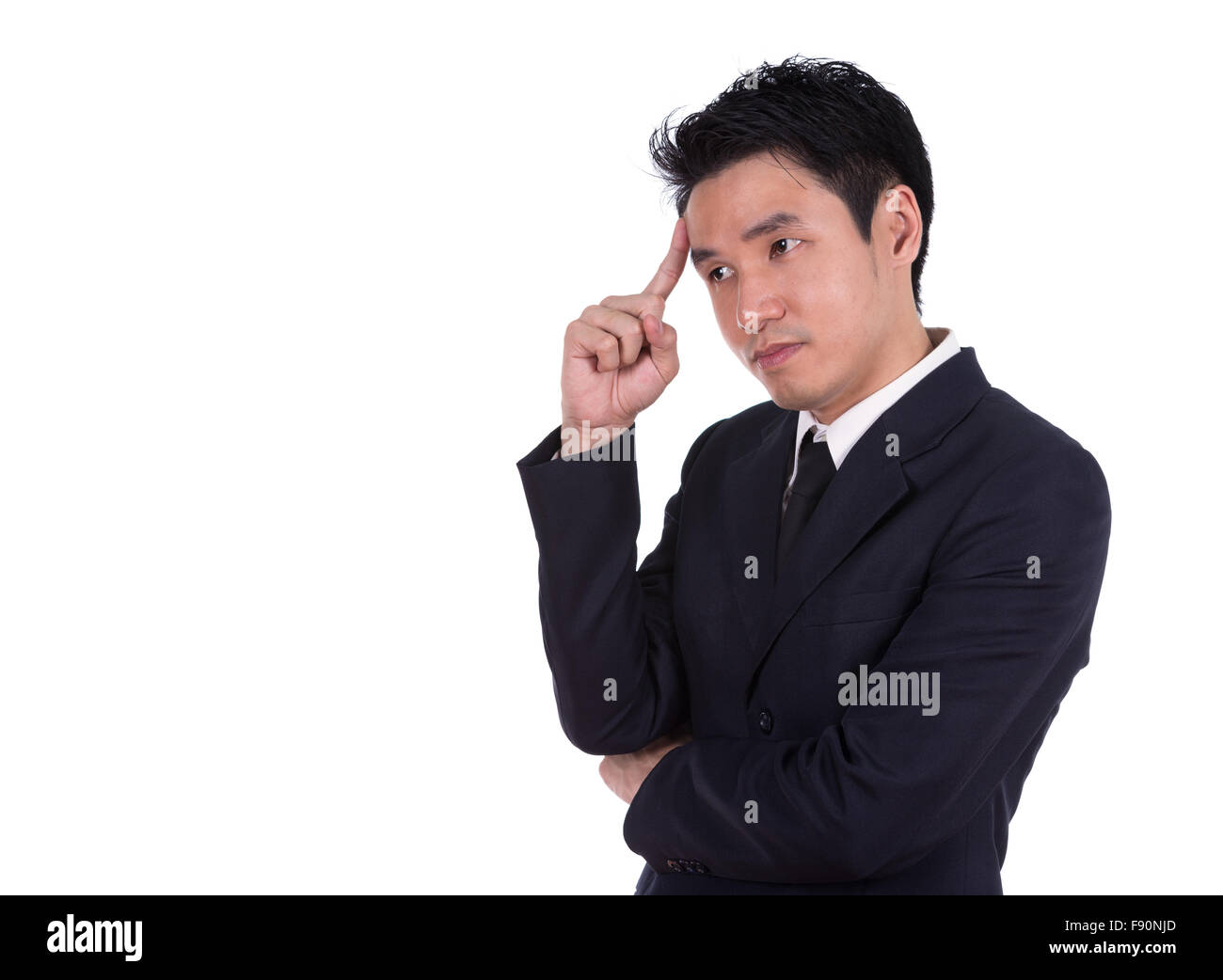 Serious business man thinking isolated on white background Stock Photo ...