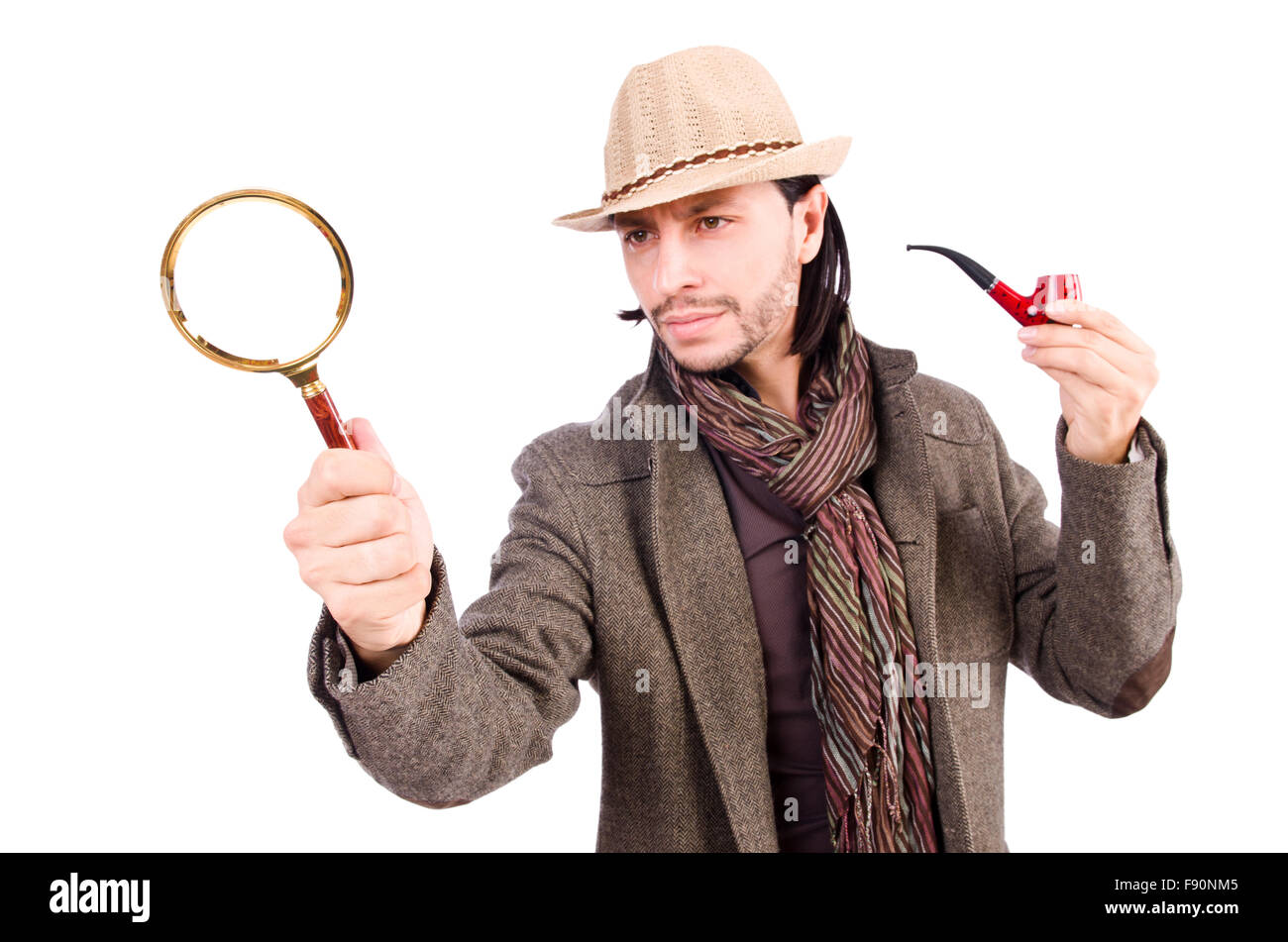Young detective with pipe and magnifying glass Stock Photo - Alamy