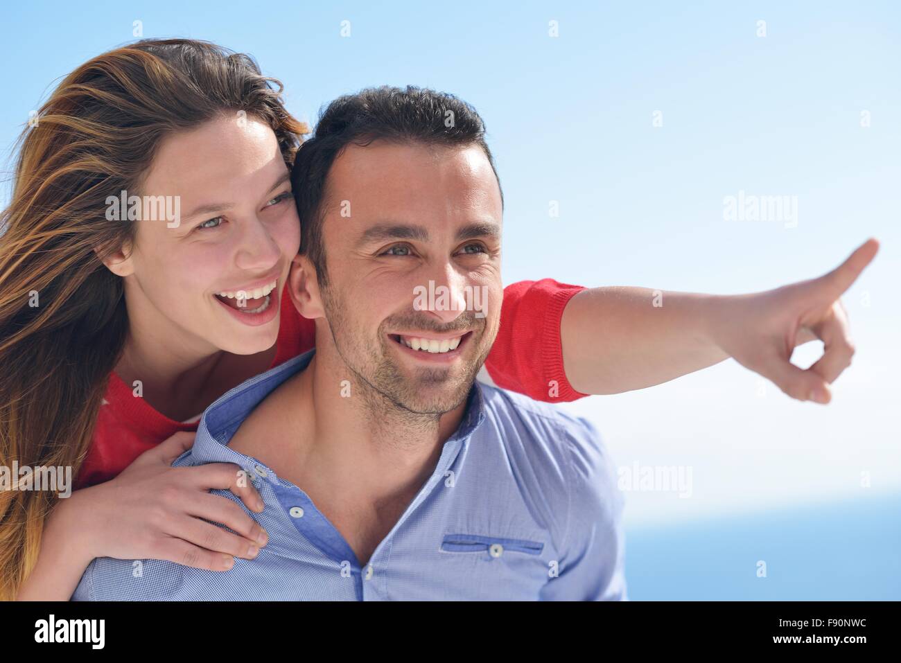 happy young romantic couple have fun relax smile at modern home indoor ...
