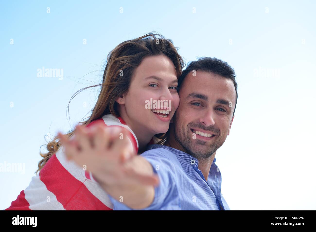 happy young romantic couple have fun relax smile at modern home indoor ...