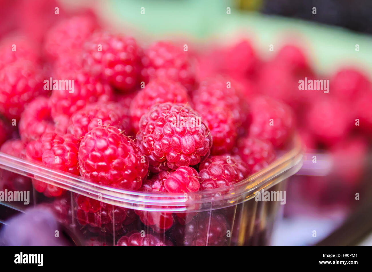 Fresh raspberry at market Stock Photo - Alamy