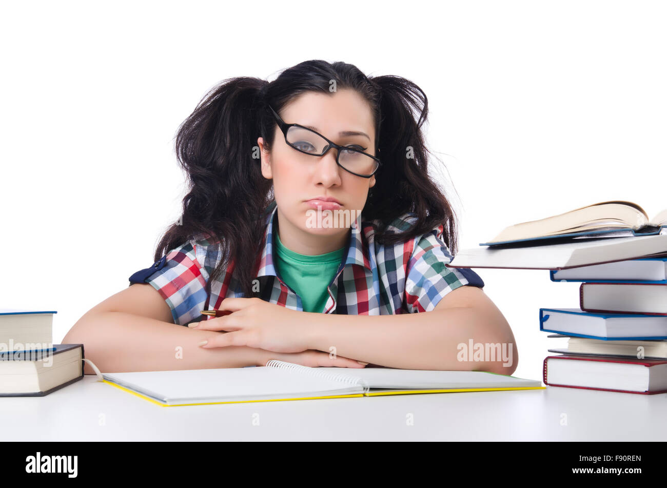 Tired student with textbooks on white Stock Photo - Alamy