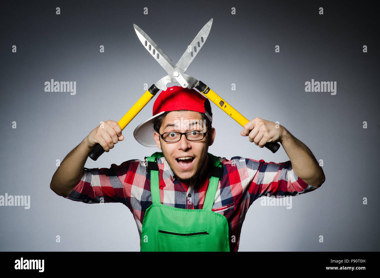 Funny man with giant shears Stock Photo - Alamy