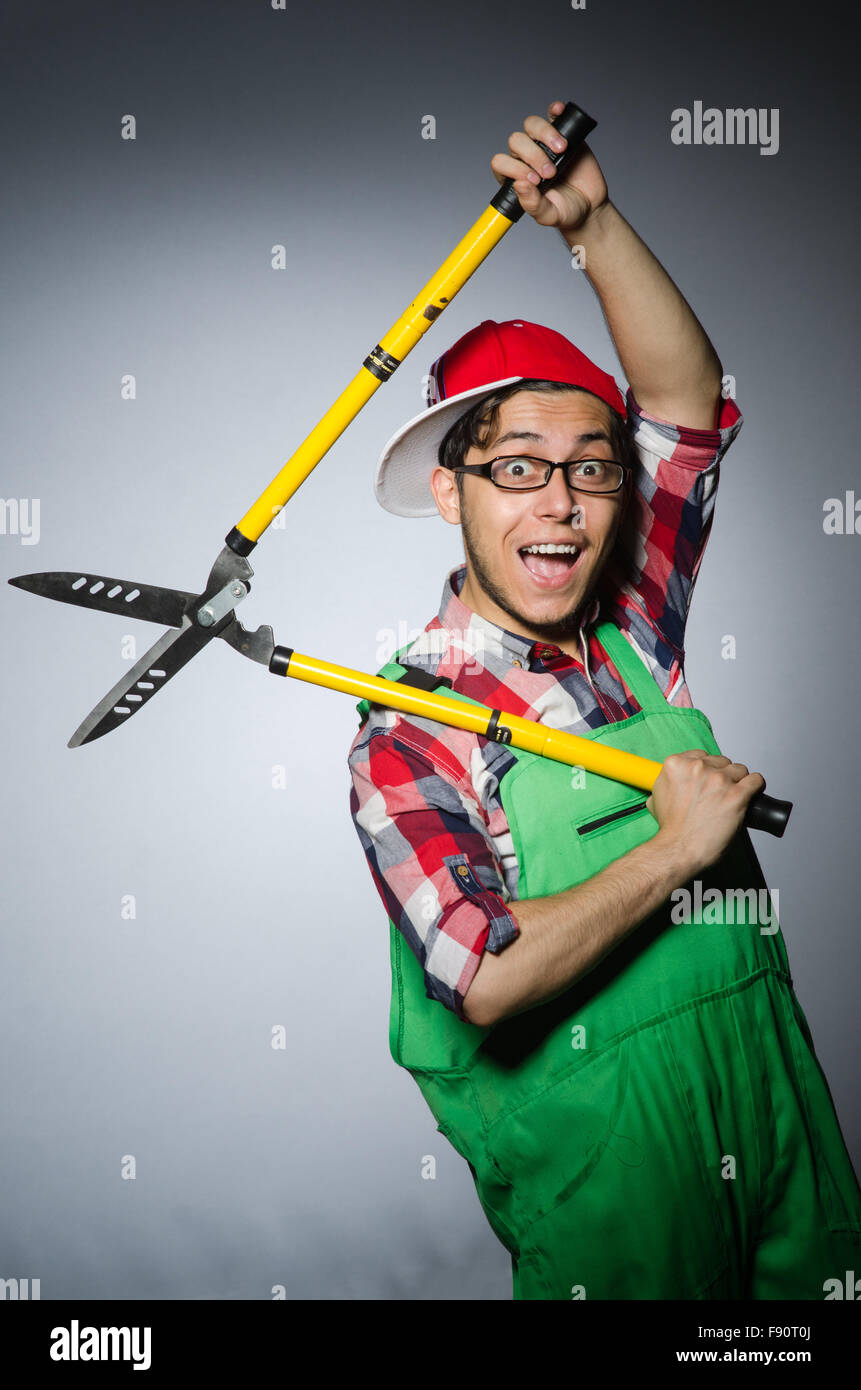 Funny man with giant shears Stock Photo - Alamy
