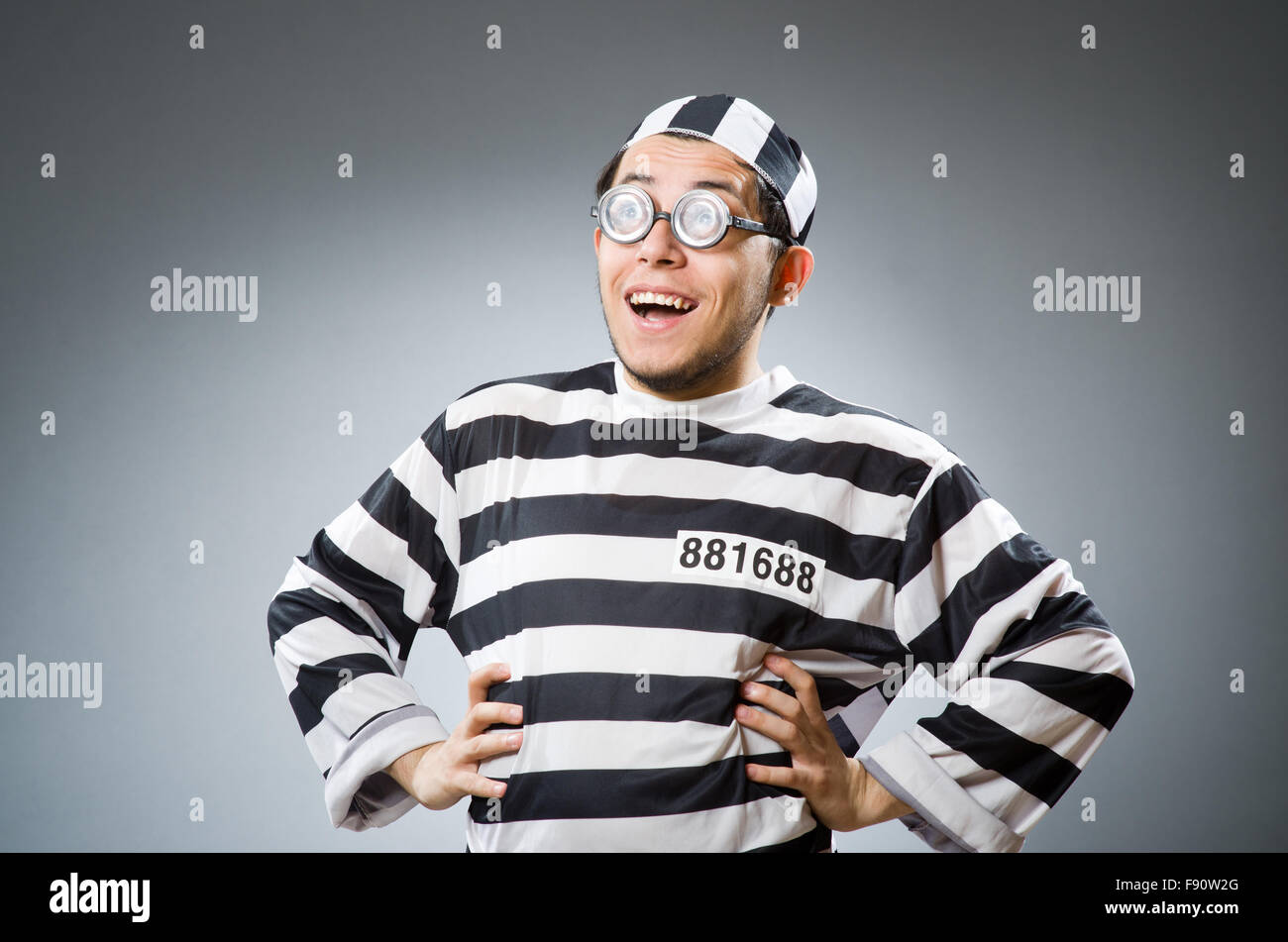 Funny prison inmate in concept Stock Photo - Alamy