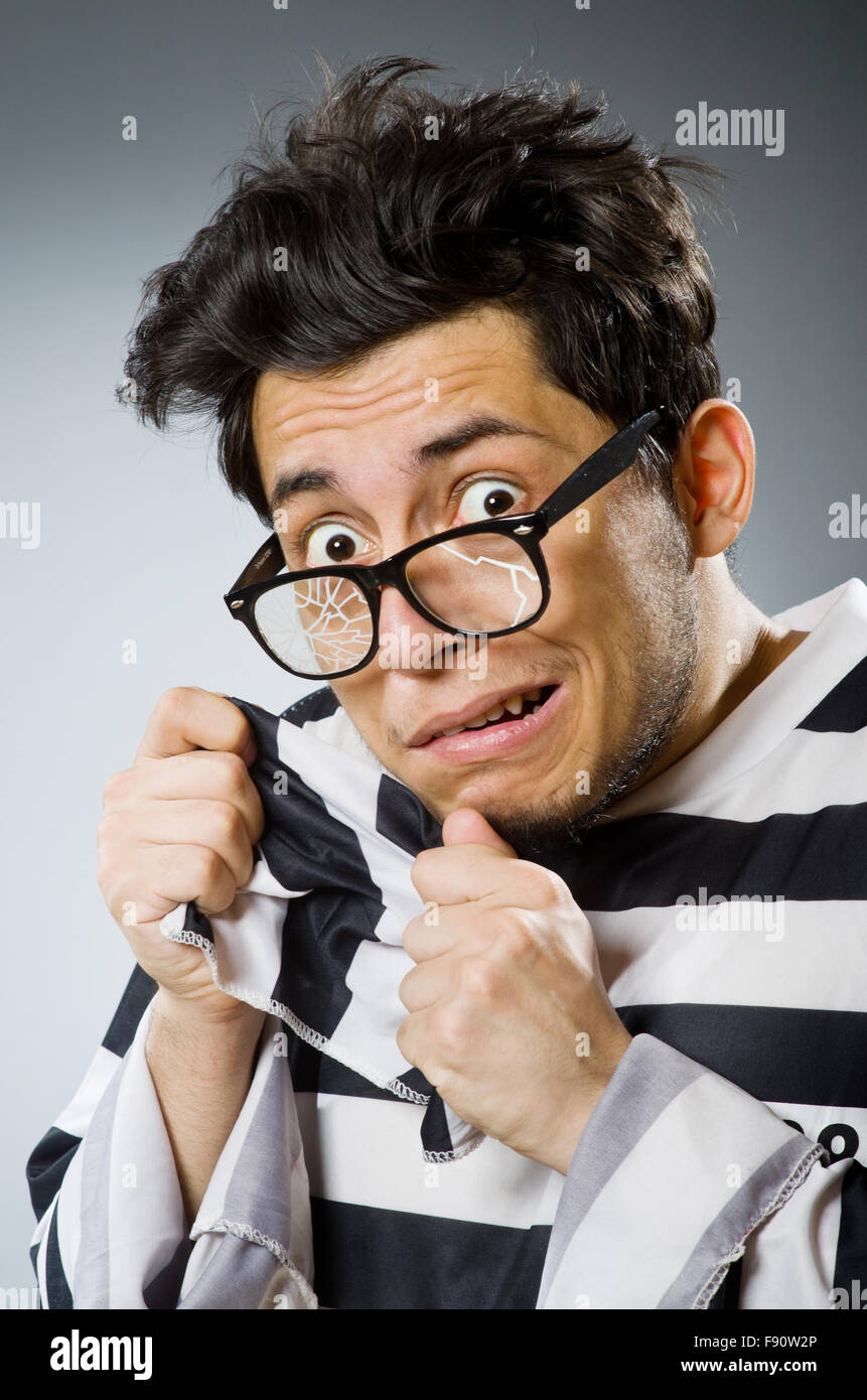 Funny prison inmate in concept Stock Photo - Alamy