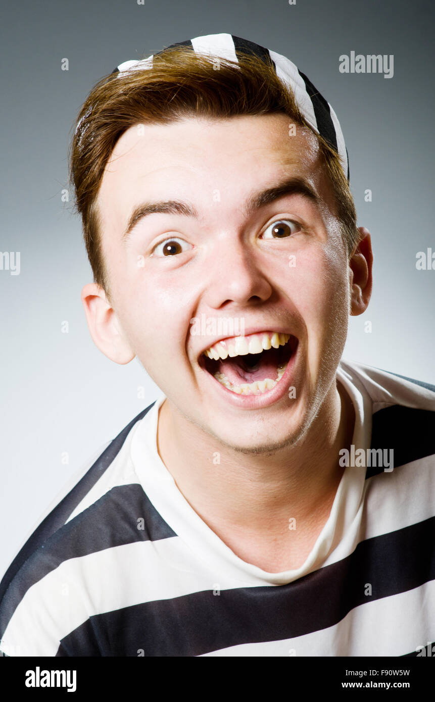 Funny prison inmate in concept Stock Photo - Alamy