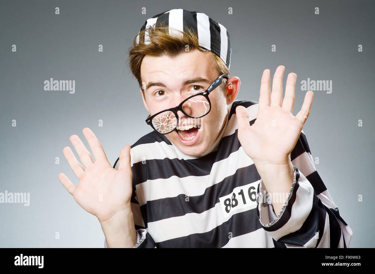 Funny prison inmate in concept Stock Photo - Alamy