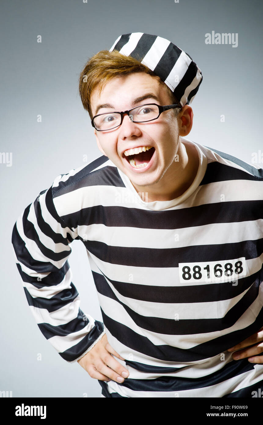Funny prison inmate in concept Stock Photo - Alamy