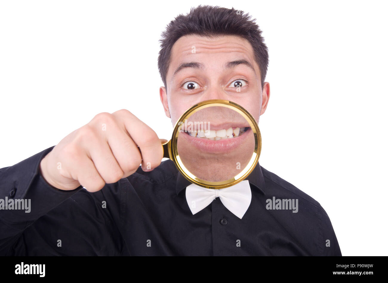 Funny man with magnifying glass Stock Photo - Alamy
