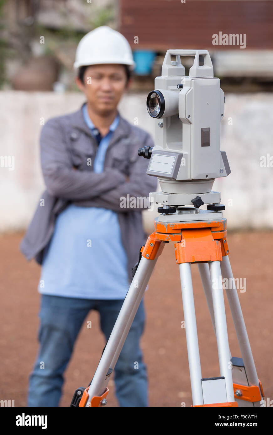 Surveyor equipment tacheometer or theodolite outdoors with engineer ...
