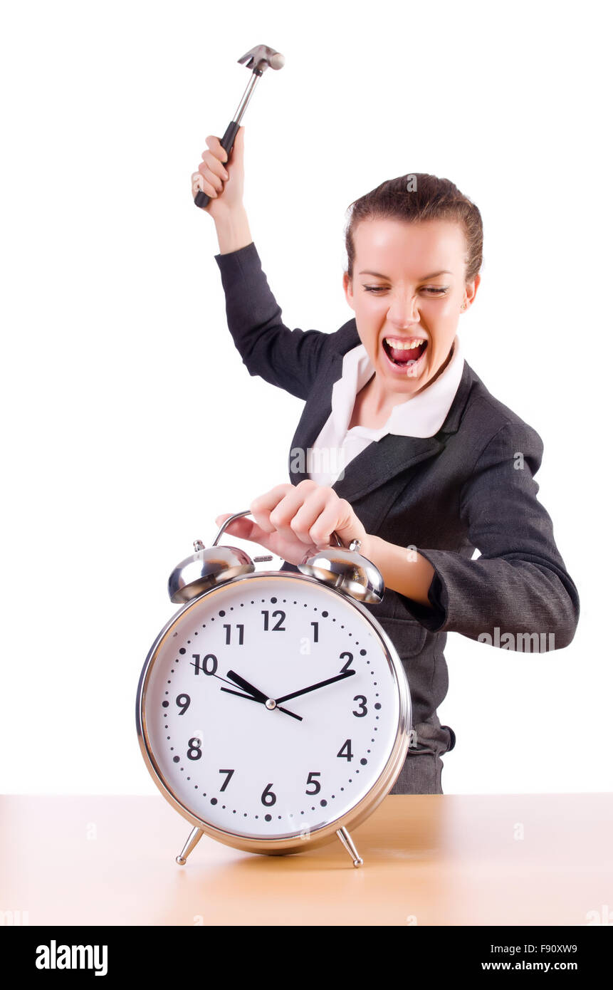 Woman desperate with time hitting clock with hammer Stock Photo - Alamy