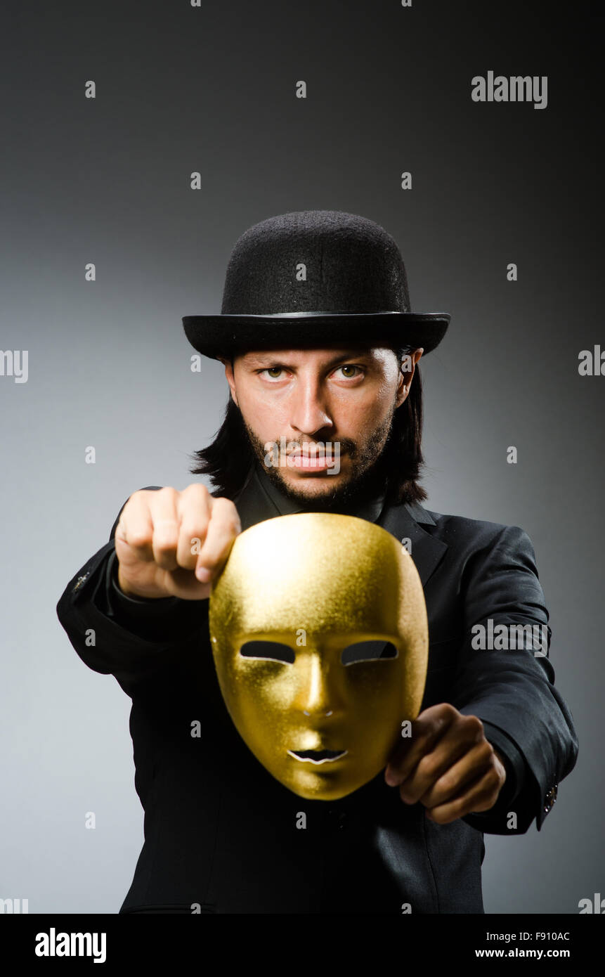 Funny concept with theatrical mask Stock Photo - Alamy