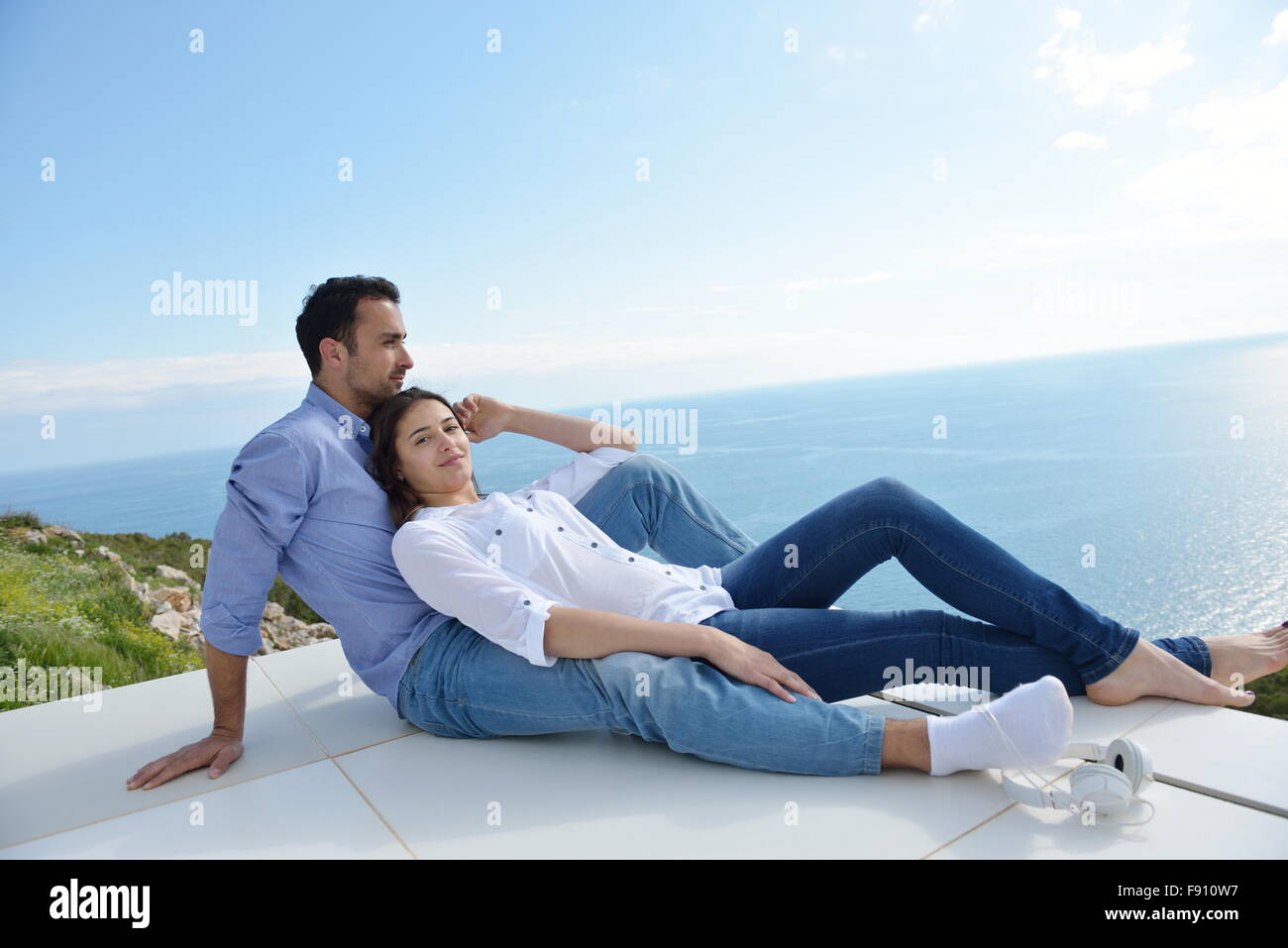 romantic happy young couple relax at modern home outdoors Stock Photo ...
