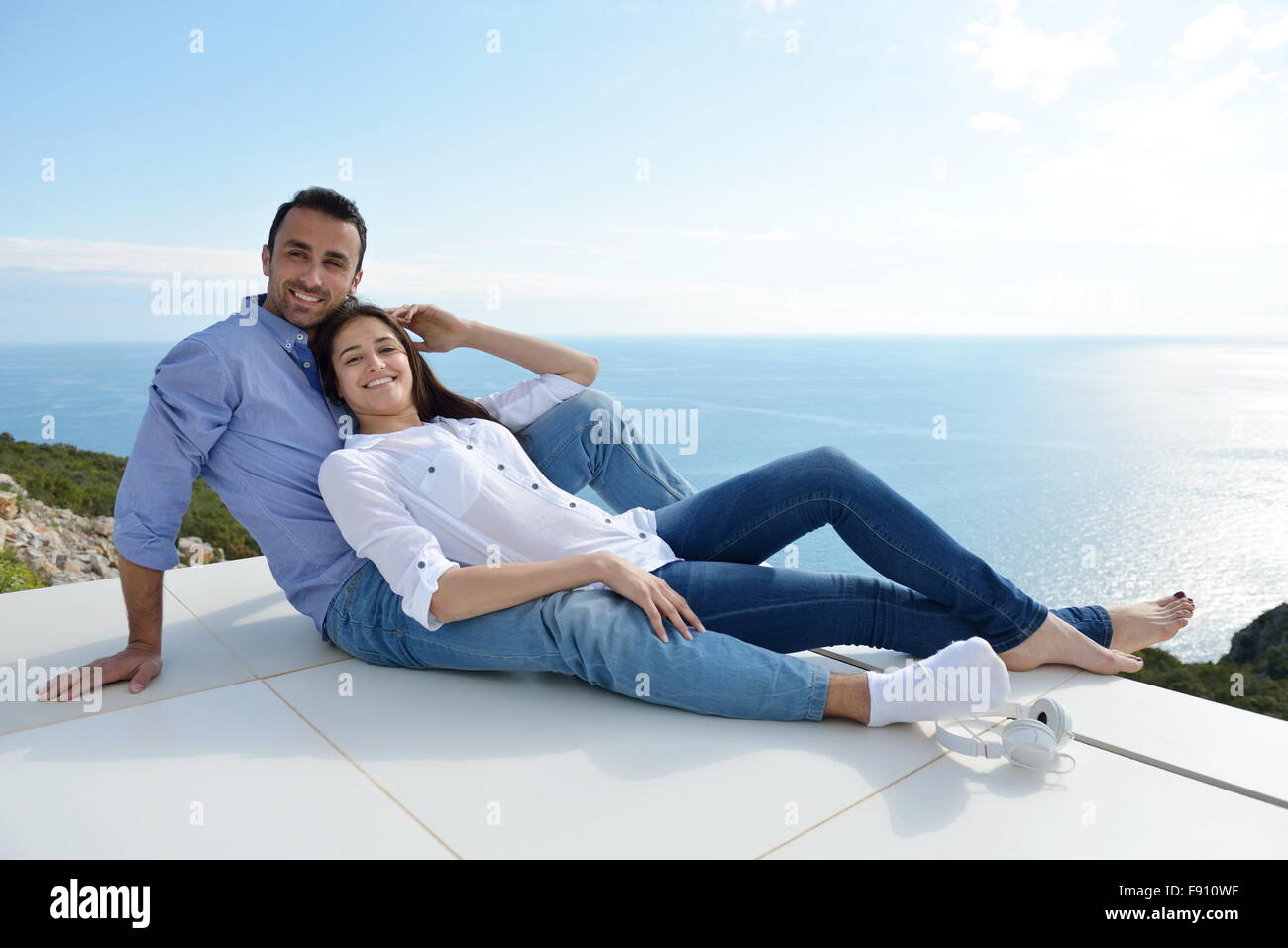 romantic happy young couple relax at modern home outdoors Stock Photo ...