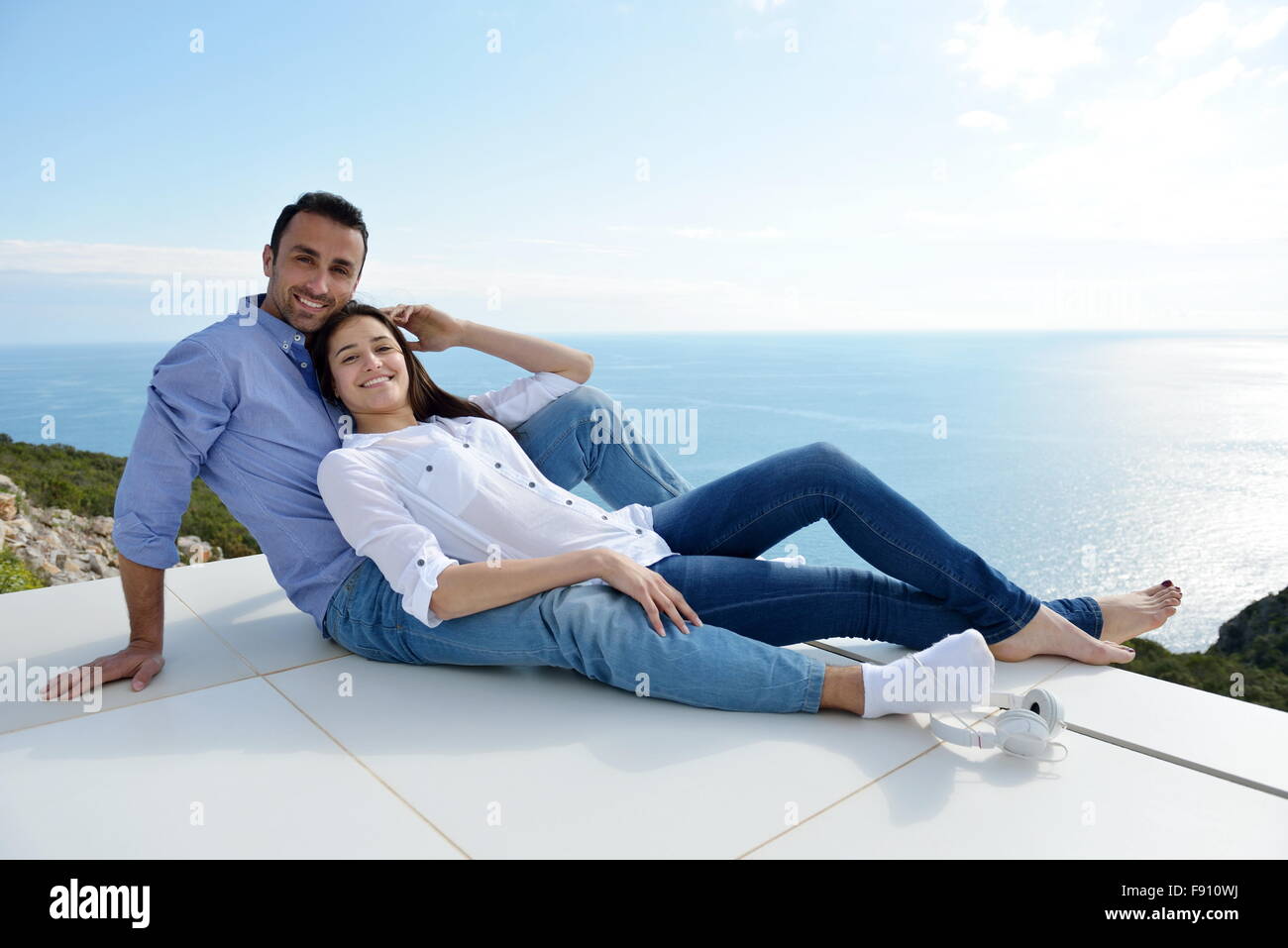 romantic happy young couple relax at modern home outdoors Stock Photo ...