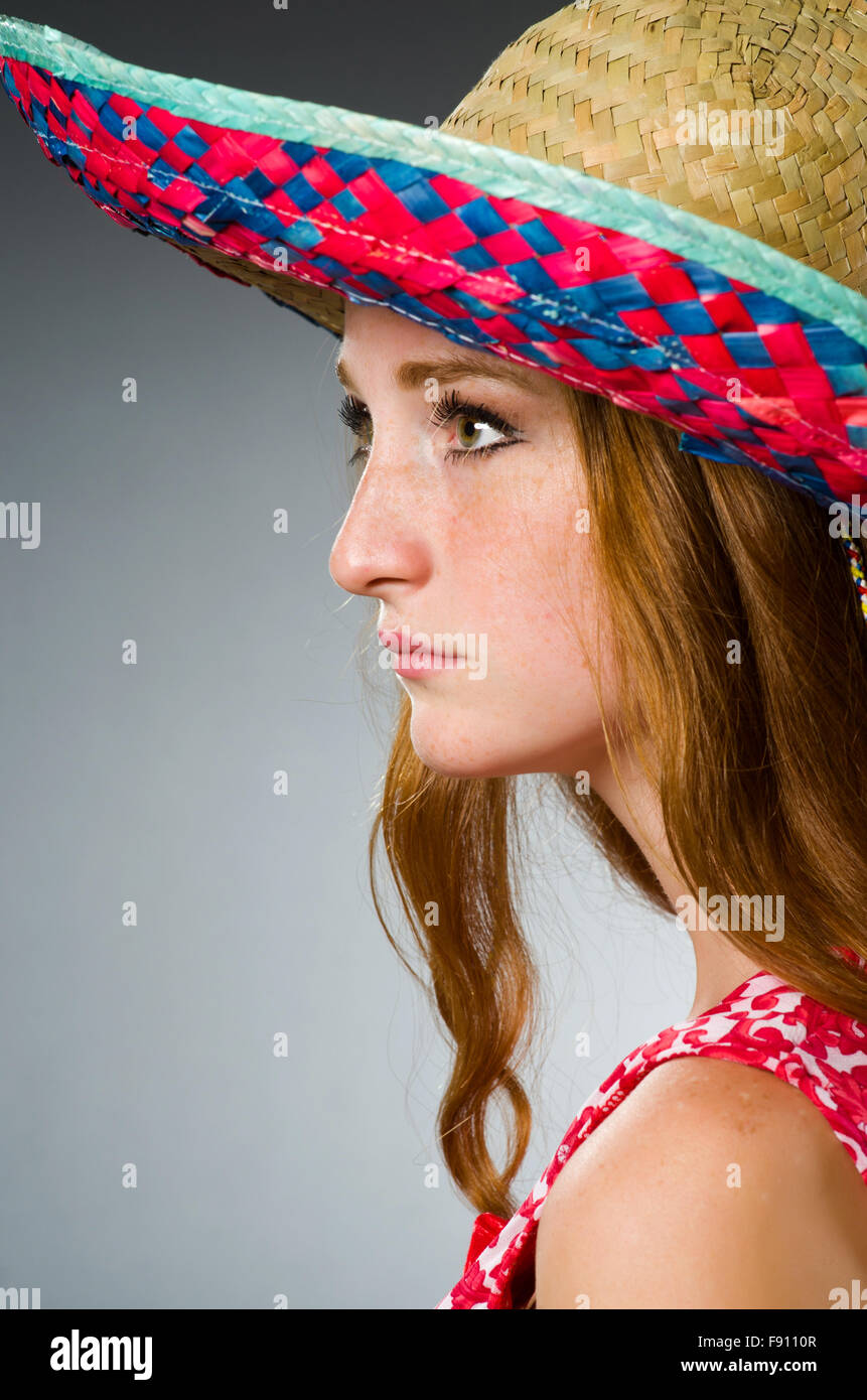 Mexican woman wearing red sombrero Stock Photo - Alamy