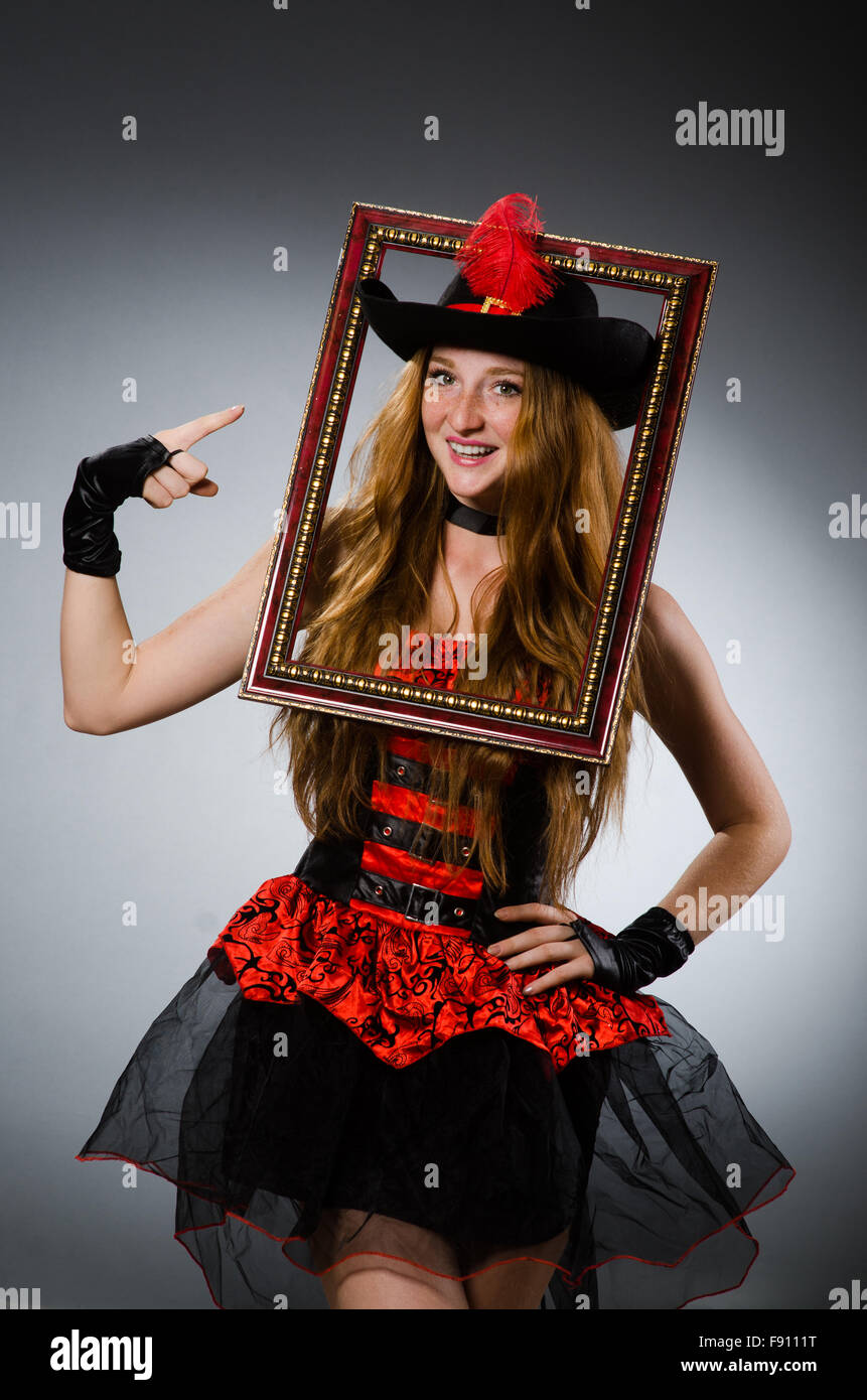 Woman pirate with picture frame Stock Photo - Alamy