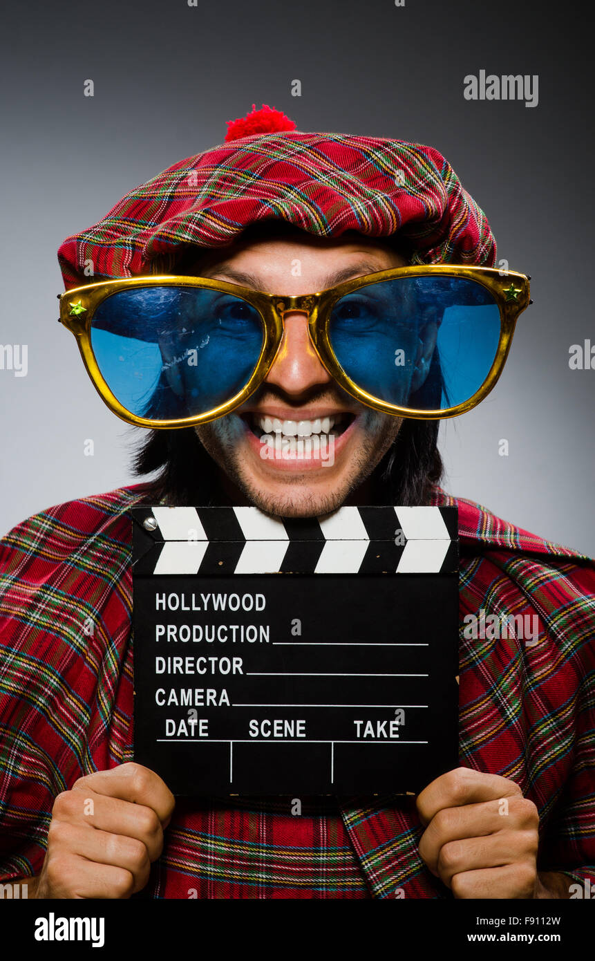 Funny scotsman with movie clapboard Stock Photo - Alamy