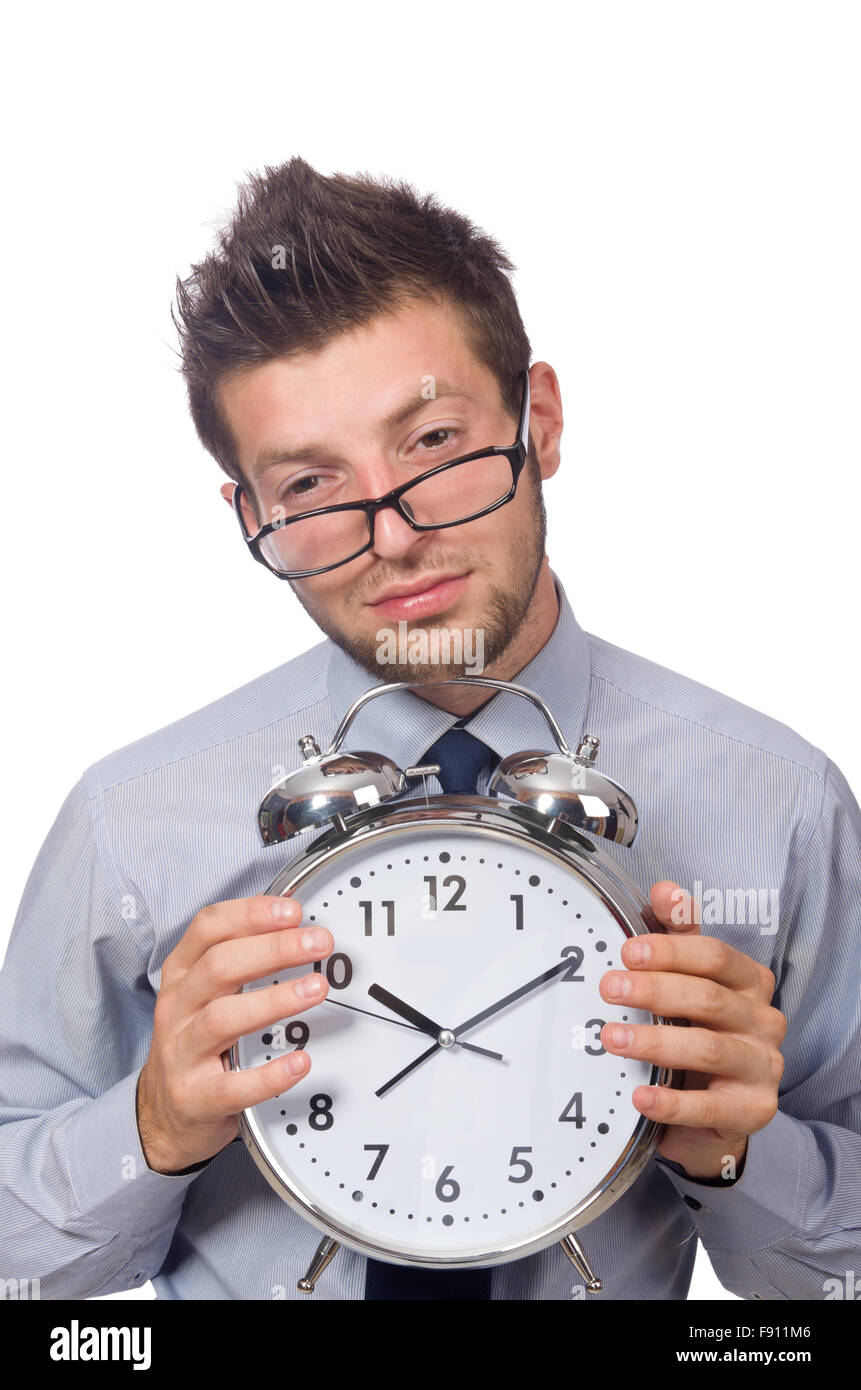 Man with clock trying to meet the deadline isolated on white Stock ...